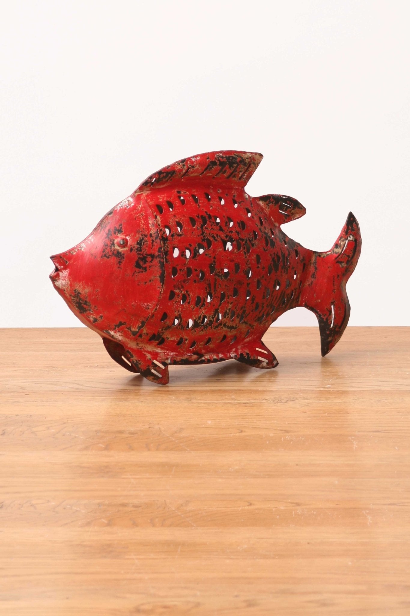 Red Iron Fish – Pino & Jacaranda